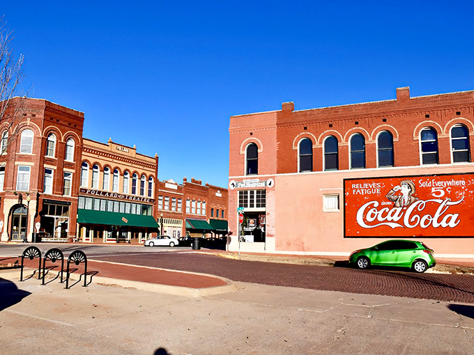 Downtown Guthrie's main drag looks like a movie set, except the Coca-Cola sign is real and so is the charm.