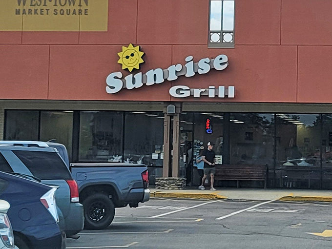 That cheerful sun logo isn't just decoration—it's a promise that your day is about to get significantly brighter, one pancake at a time.