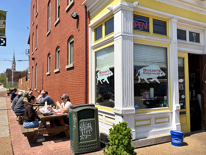The corner of culinary heaven! Bogart's bright yellow-trimmed storefront in Soulard beckons barbecue pilgrims with outdoor seating where smoke-scented conversations flow freely.
