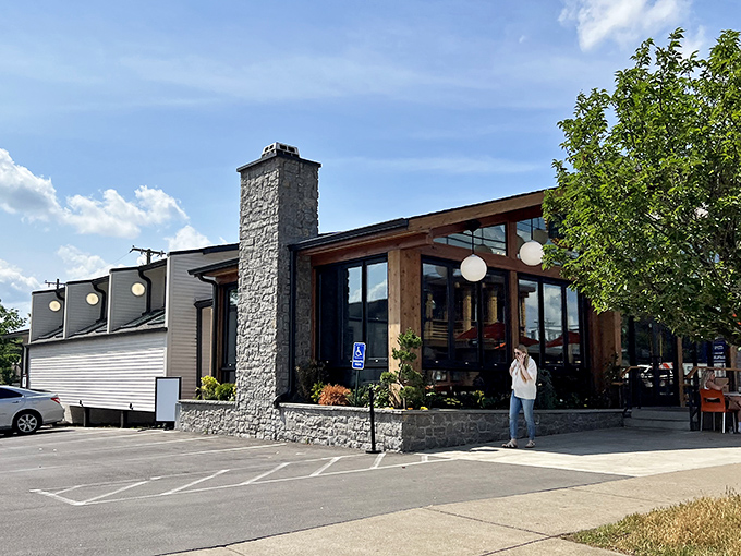 Stone meets wood in this architectural symphony of breakfast dreams. The Butter Milk Ranch's exterior promises culinary adventures before you even step inside.