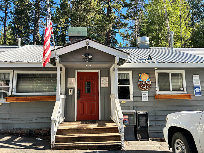 The unassuming exterior of Fire Sign Caf&eacute; stands like a culinary lighthouse among the pines, promising breakfast salvation to hungry Tahoe travelers.
