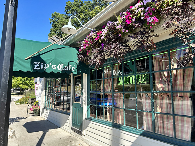 The green awning and vibrant flower boxes aren't just decoration &ndash; they're Cincinnati's equivalent of a welcome mat saying "come hungry, leave happy."