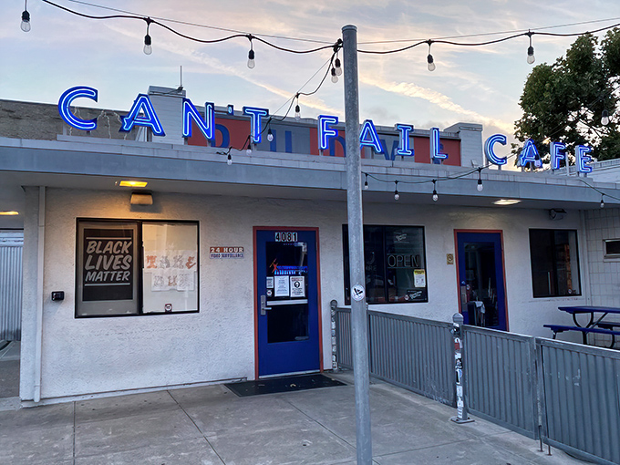 The iconic blue neon sign beckons hungry travelers like a culinary lighthouse. Rudy's Can't Fail Cafe doesn't just promise a meal&mdash;it delivers an experience.