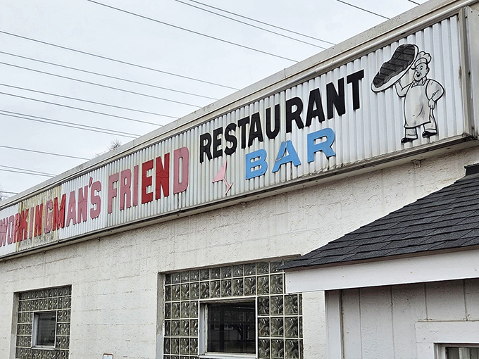 The corrugated metal sign says it all &ndash; unpretentious, straightforward, and promising exactly what you'll find inside: good food and cold drinks.