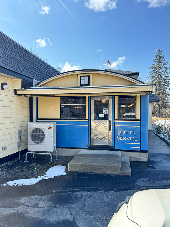 Step through this blue door and enter breakfast nirvana. The "Booth Service" sign isn't just decoration&mdash;it's a guarantee that comfort food awaits inside.