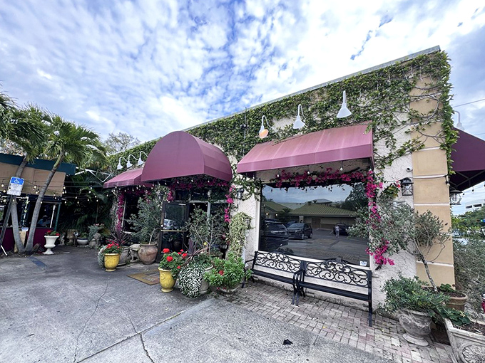 The charming exterior of Cristino's beckons with its burgundy awnings and lush greenery&mdash;a little slice of Italy hiding in plain sight in Clearwater.