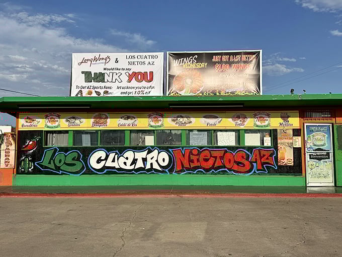 The vibrant exterior of Los Cuatro Nietos announces itself like a fiesta waiting to happen, complete with colorful signage that practically shouts "delicious food inside!"
