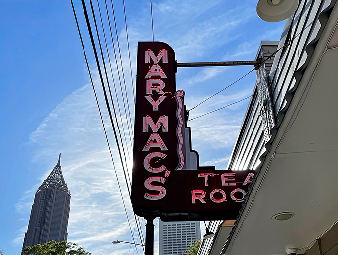 That iconic neon sign has guided hungry souls to comfort food salvation for decades, standing tall against Atlanta's modern skyline like a delicious time portal.