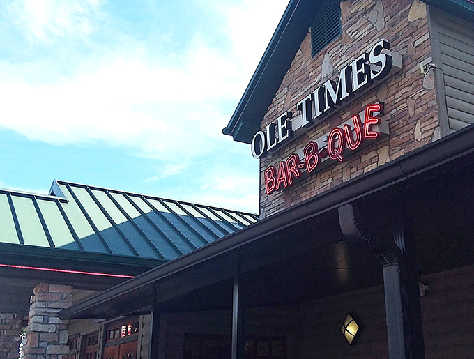 That glowing "BAR-B-QUE" sign isn't just neon&mdash;it's a beacon calling hungry travelers home to comfort food paradise.