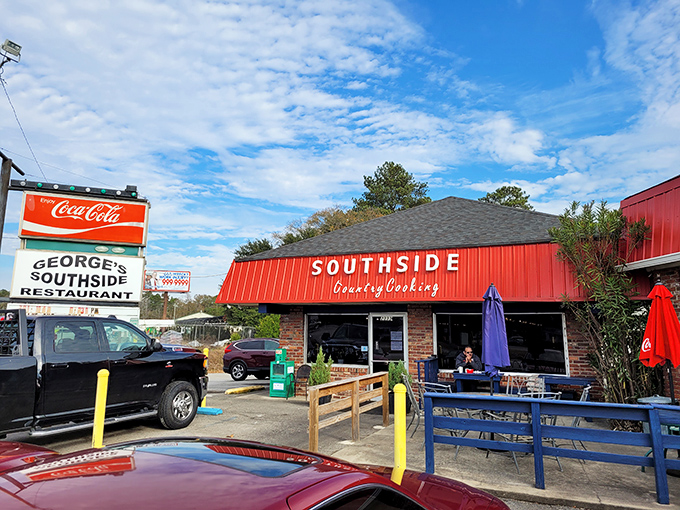 The iconic red awning and Coca-Cola sign welcome hungry travelers like a Southern grandmother ready with a warm hug and hot breakfast.