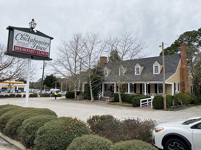 The colonial charm of Old Chickahominy House beckons from Jamestown Road, its yellow clapboard exterior and dormer windows promising comfort food and historical ambiance.