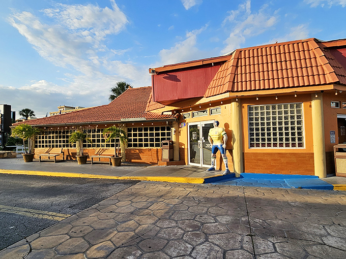 Cafe Mineiro greets visitors with a life-sized statue at the door, hinting at the hearty Brazilian-style feast waiting inside.
