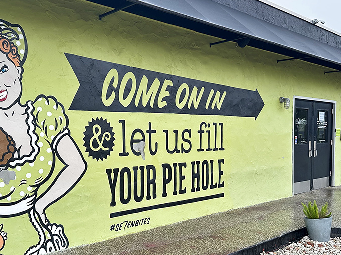 The lime-green exterior with its cheeky "fill your pie hole" mural sets the tone immediately—this isn't your grandmother's bakery (though she'd probably love it).