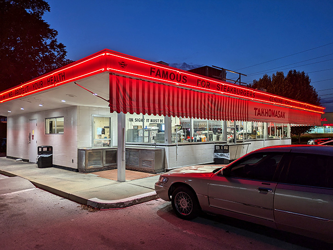 The iconic red and white awning glows like a beacon for hungry travelers. Americana never looked so appetizing!