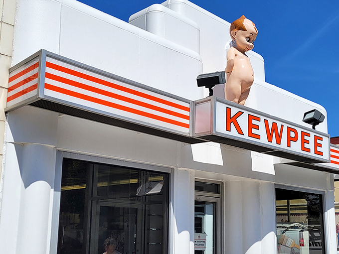 The iconic Kewpee exterior stands like a time capsule of Americana, complete with its Art Deco styling and that watchful doll keeping an eye on hungry visitors.