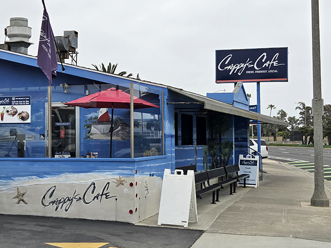 The unmistakable blue beacon of Cappy's Caf&eacute; stands out against the California sky, promising breakfast salvation to hungry Newport Beach locals and visitors alike.