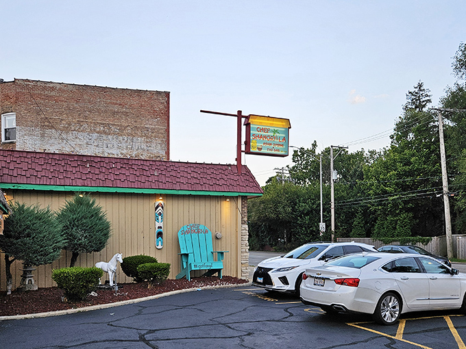 The unassuming exterior of Chef Shangri-La might fool you, but that turquoise Adirondack chair is practically winking at you, promising tropical delights inside.