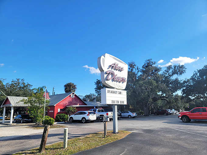 The iconic coffee cup sign welcomes hungry travelers to this red-roofed oasis of comfort food. Florida's blue skies provide the perfect backdrop.