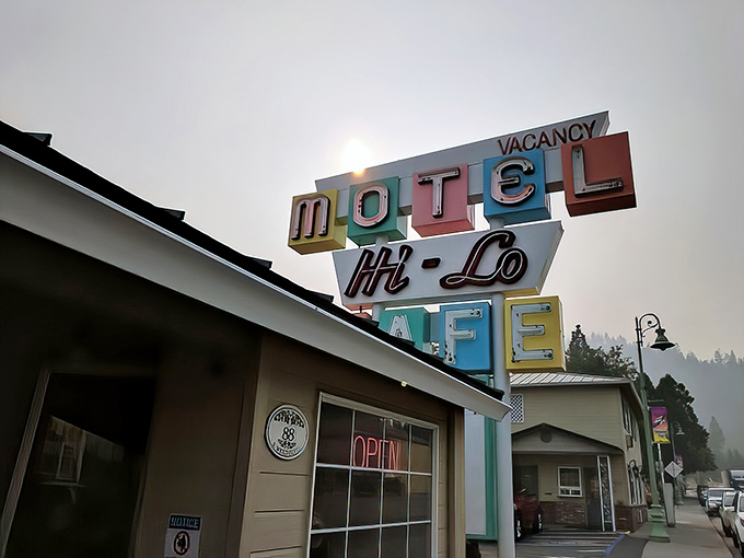 That vintage neon sign isn't just advertising&mdash;it's a time machine to when roadside diners were America's culinary heartbeat. Pure mid-century magic!