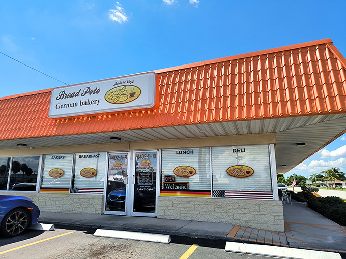 The bright orange roof of Bread Pete stands out like a culinary lighthouse, beckoning carb enthusiasts to this unassuming strip mall treasure in Cape Coral.