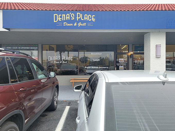The bright blue awning of Dena's Place stands out like a beacon for breakfast lovers in Lakeland, promising homestyle comfort without the frills.