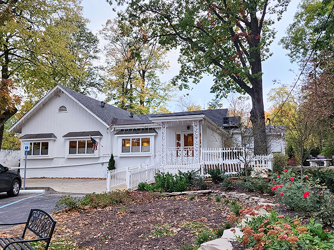 When autumn paints the trees around Hollyhock Hill, the white picket fence and blooming garden create the perfect prelude to a meal that feels like coming home.