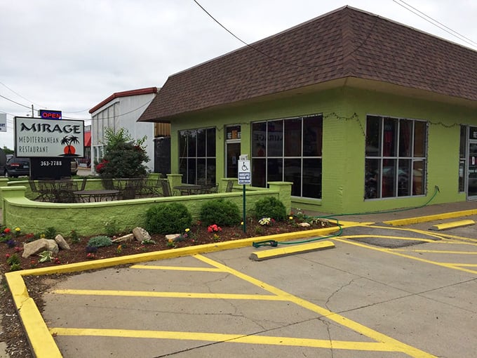 That cheerful green exterior isn't trying to blend in—it's announcing itself like a delicious beacon of Mediterranean hope.