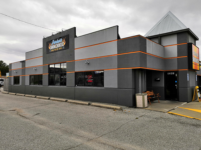 The unassuming gray exterior with orange accents might not scream "culinary destination," but that's how the best BBQ joints operate&mdash;hiding in plain sight.