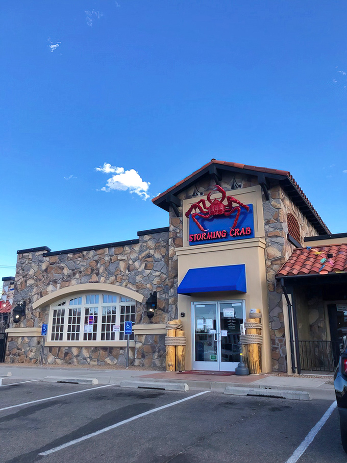 The bright red crab perched atop Storming Crab's stone facade is like a desert mirage, except this seafood oasis is deliciously real.