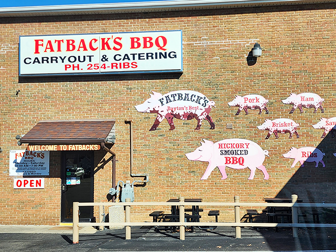 The pig silhouettes on Fatback's brick exterior aren't just decoration&mdash;they're a roadmap to happiness. Follow the pigs to barbecue bliss.