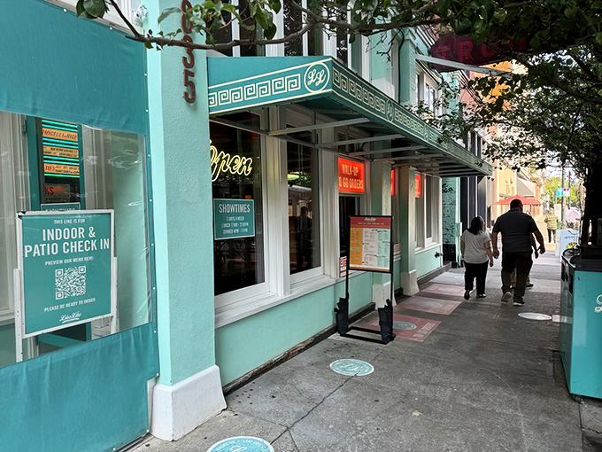 The turquoise corner entrance of Luc Lac stands out like a culinary beacon against classic Portland brick, promising Vietnamese delights within.