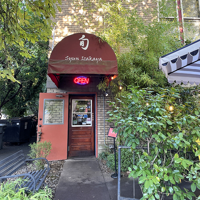 A welcoming red awning and neon "OPEN" sign beckon food adventurers to this Japanese oasis in Hillsboro.