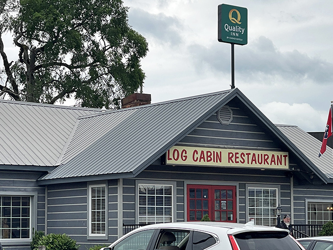 Those iconic red doors against the gray exterior aren't just welcoming &ndash; they're practically a beacon for hungry travelers seeking authentic Tennessee flavor.