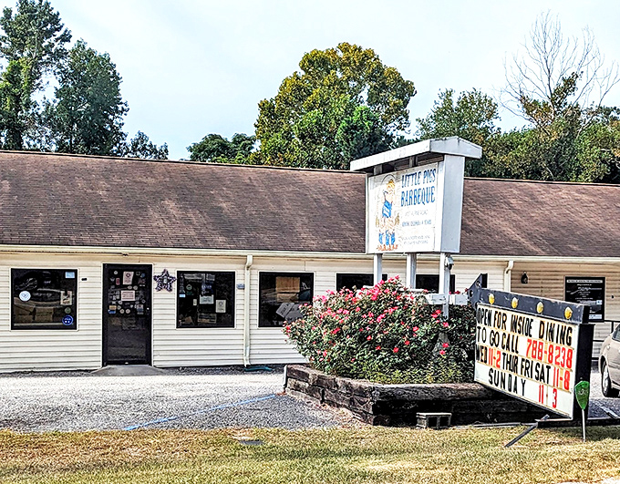 The unassuming roadside charm of Little Pigs Barbecue calls out to hungry travelers like a true barbecue beacon. No frills, just the promise of smoky, Southern perfection inside.