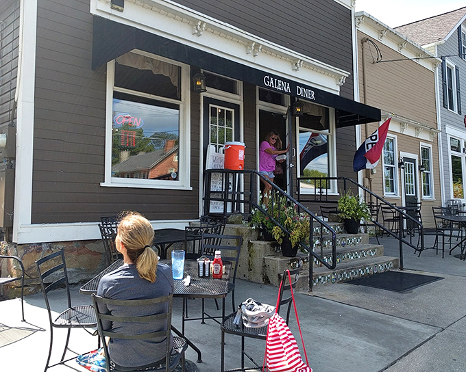 The charming exterior of Galena Diner beckons like an old friend, complete with wrought iron tables where locals linger over coffee and conversation. 