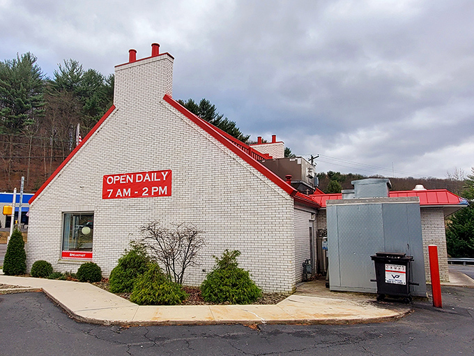 The white brick exterior with its distinctive red roof and trim stands like a beacon for hungry travelers. Open daily 7AM-2PM&mdash;plan accordingly!