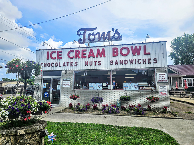 The unassuming white brick fa&ccedil;ade of Tom's Ice Cream Bowl stands as a beacon to ice cream pilgrims. This isn't architecture&mdash;it's a promise of deliciousness inside.