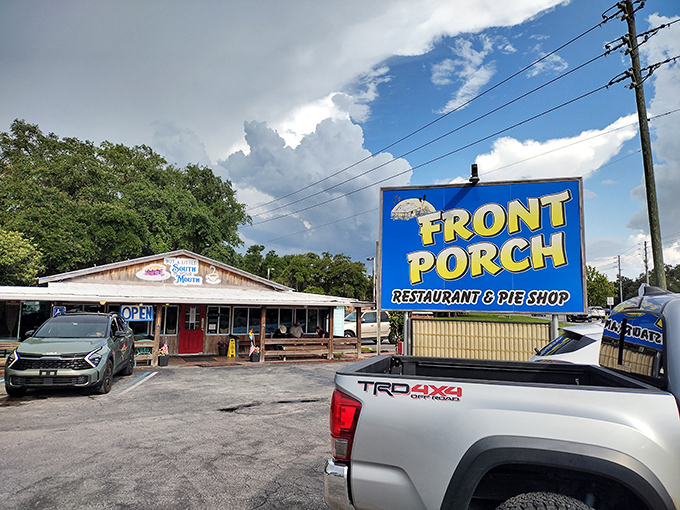 That iconic blue sign might as well say "Abandon Diets, All Ye Who Enter Here." Florida comfort food paradise awaits.