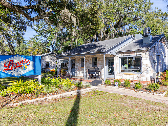 Leon's charming stone cottage exterior beckons like a culinary lighthouse on Lake Ella's shore, promising delicious treasures within its weathered walls.