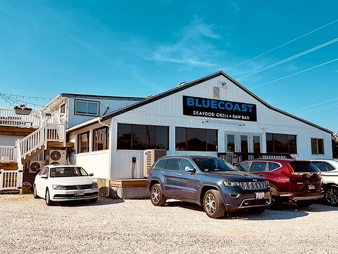 The iconic blue sign welcomes hungry visitors to this beloved Bethany Beach institution where seafood dreams come true.