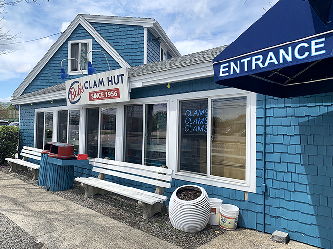 That cheerful blue exterior isn't just a building—it's a lighthouse guiding hungry souls to fried seafood salvation since Ike was president.