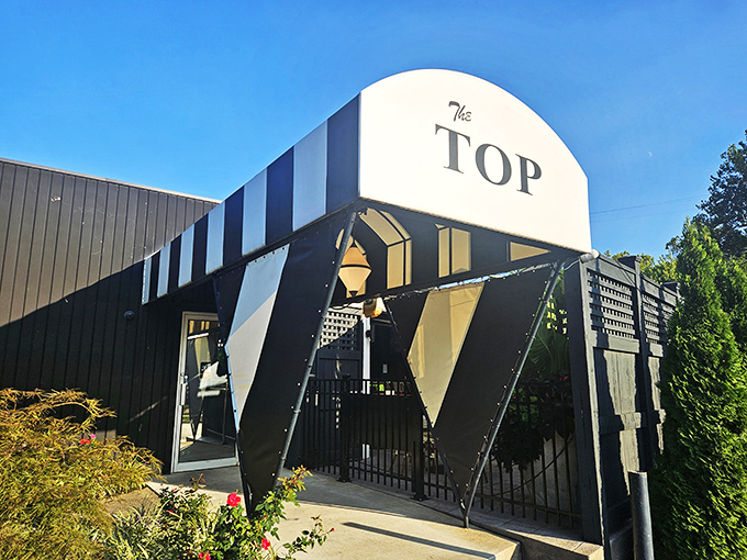 Where retro meets remarkable &ndash; The Top's distinctive exterior design makes a bold architectural statement before you even taste the food.