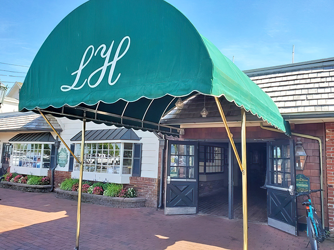 That emerald canopy isn't just an entrance&mdash;it's a portal to a world where lobster dreams come true and diet plans go to die.