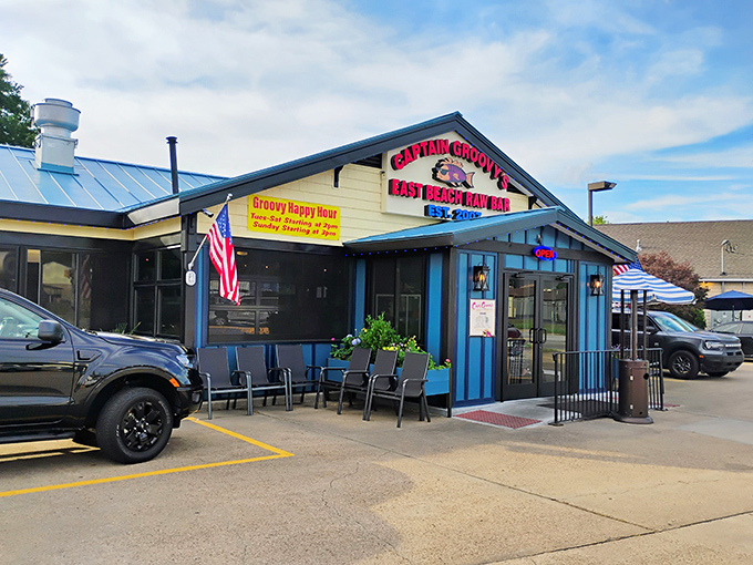 Captain Groovy's blue-trimmed exterior stands like a cheerful maritime beacon, promising seafood treasures within. No pretension, just delicious possibilities.
