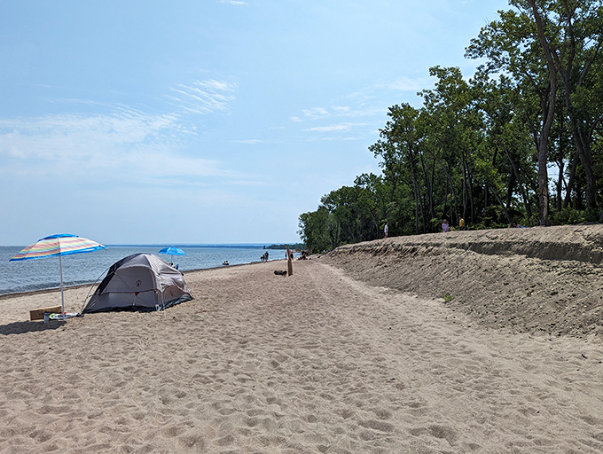 Beach camping at its finest &ndash; because sometimes paradise needs a tent and a colorful umbrella for company.