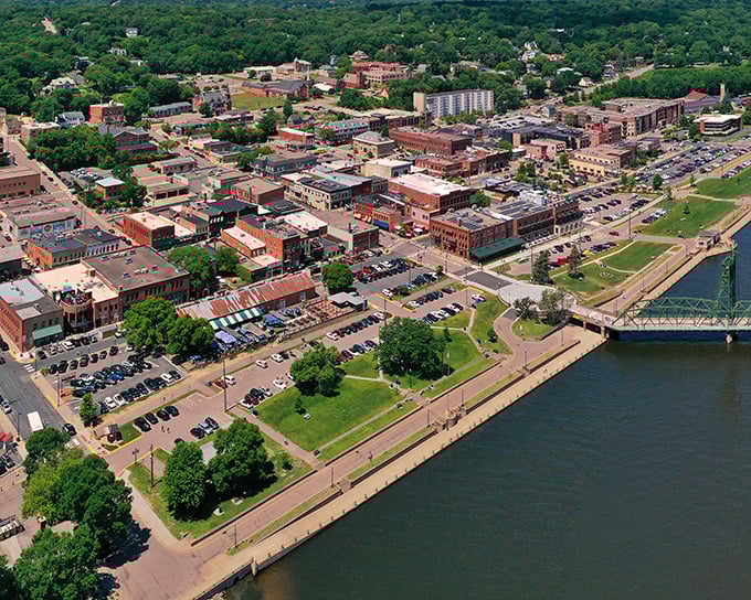 Stillwater's downtown riverfront unfolds like a miniature San Francisco without the hills&mdash;brick buildings, green spaces, and that magnificent lift bridge creating postcard perfection.