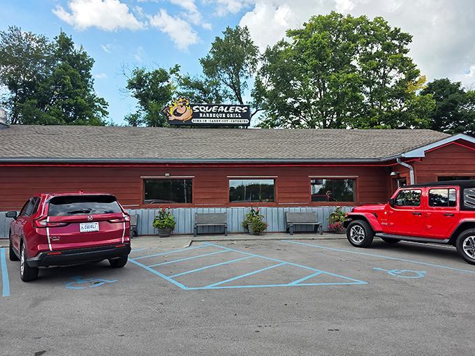 Summer or winter, that cheerful pig sign beckons meat lovers to a rustic haven where smoke signals spell "come hungry."