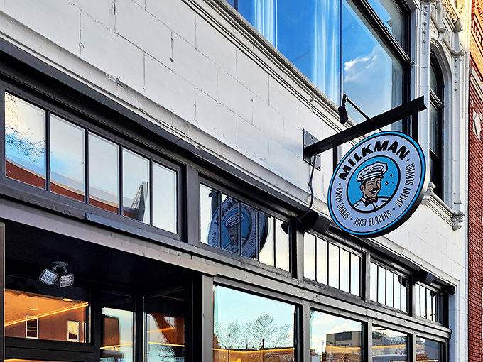 Milkman's storefront beckons from Cincinnati's historic Over-the-Rhine district, its circular logo promising burger bliss to those wise enough to step inside.
