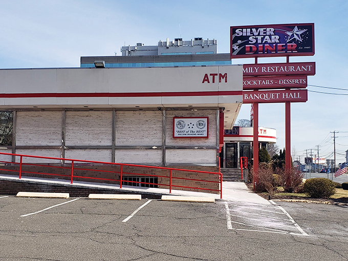 The Silver Star Diner's exterior promises what every Connecticut road warrior craves: a sanctuary where calories don't count and coffee cups never empty.