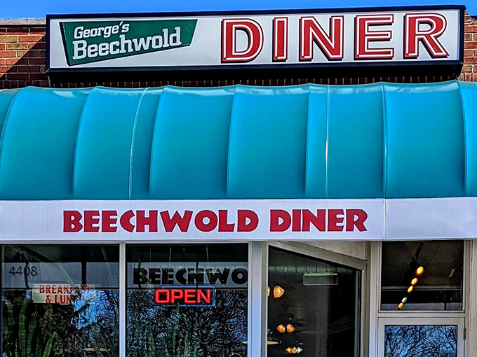 That turquoise awning isn't just eye-catching&mdash;it's a beacon of hope for hungry souls seeking authentic diner magic in Columbus.
